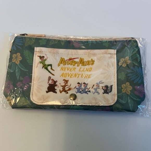 Disney | Bags | New In Plastic Peter Pan Tokyo Disney Wristlet | Poshmark